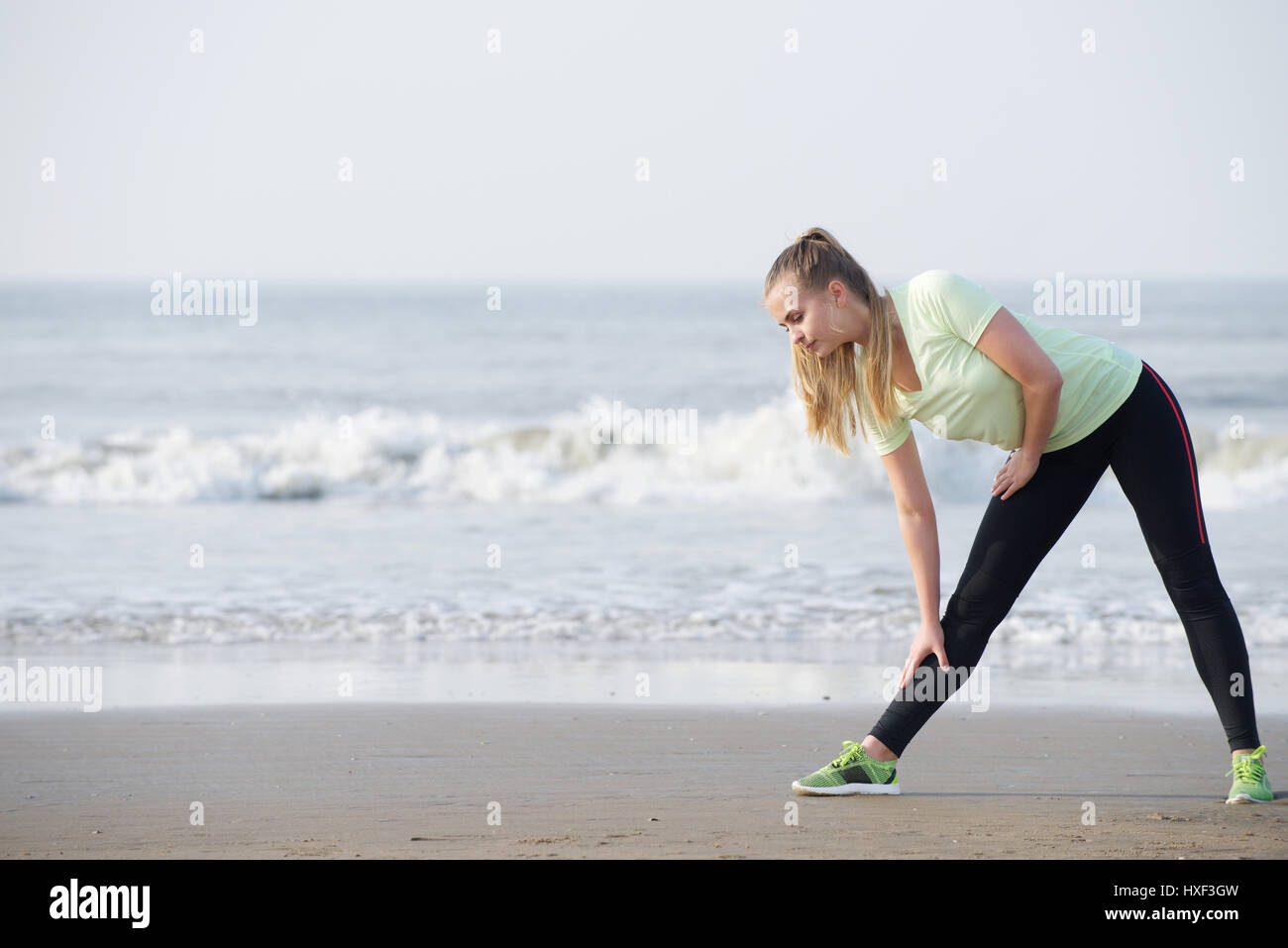 Bend down hi-res stock photography and images - Alamy