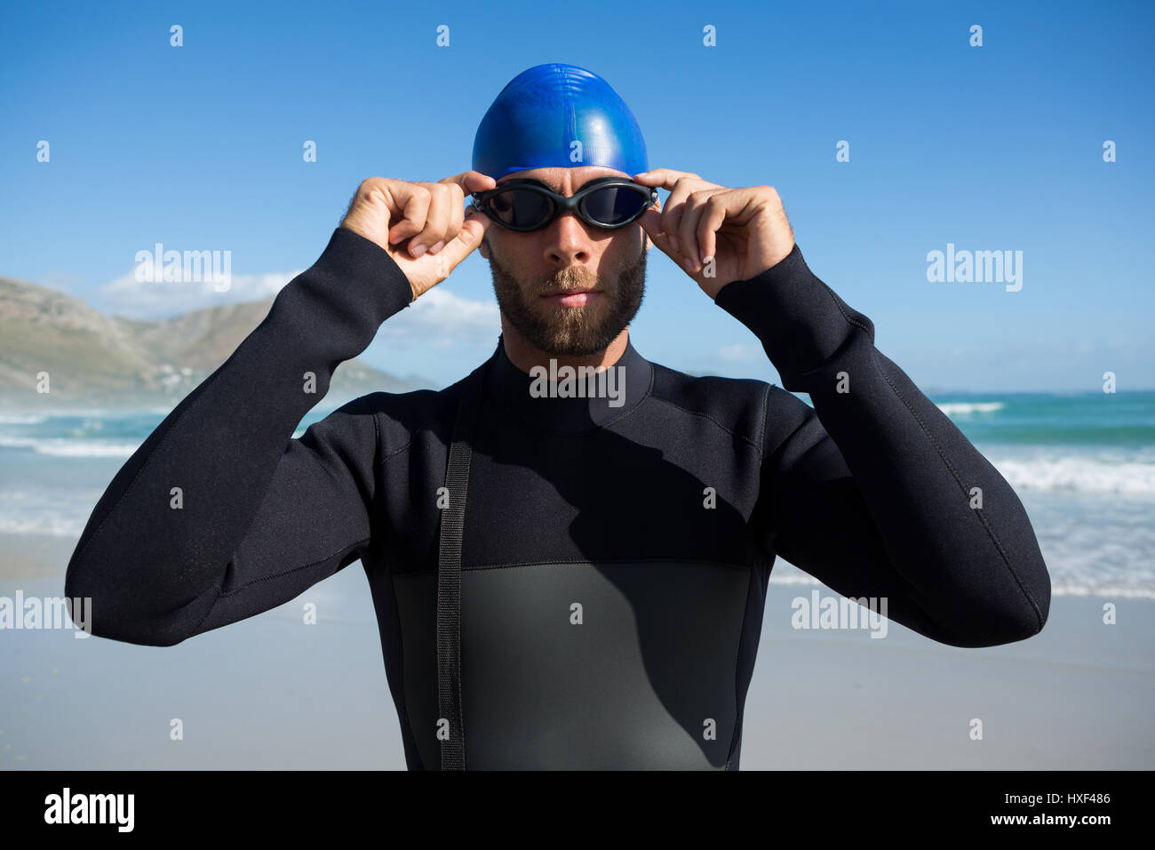 Man wearing swim goggles hi-res stock photography and images - Alamy