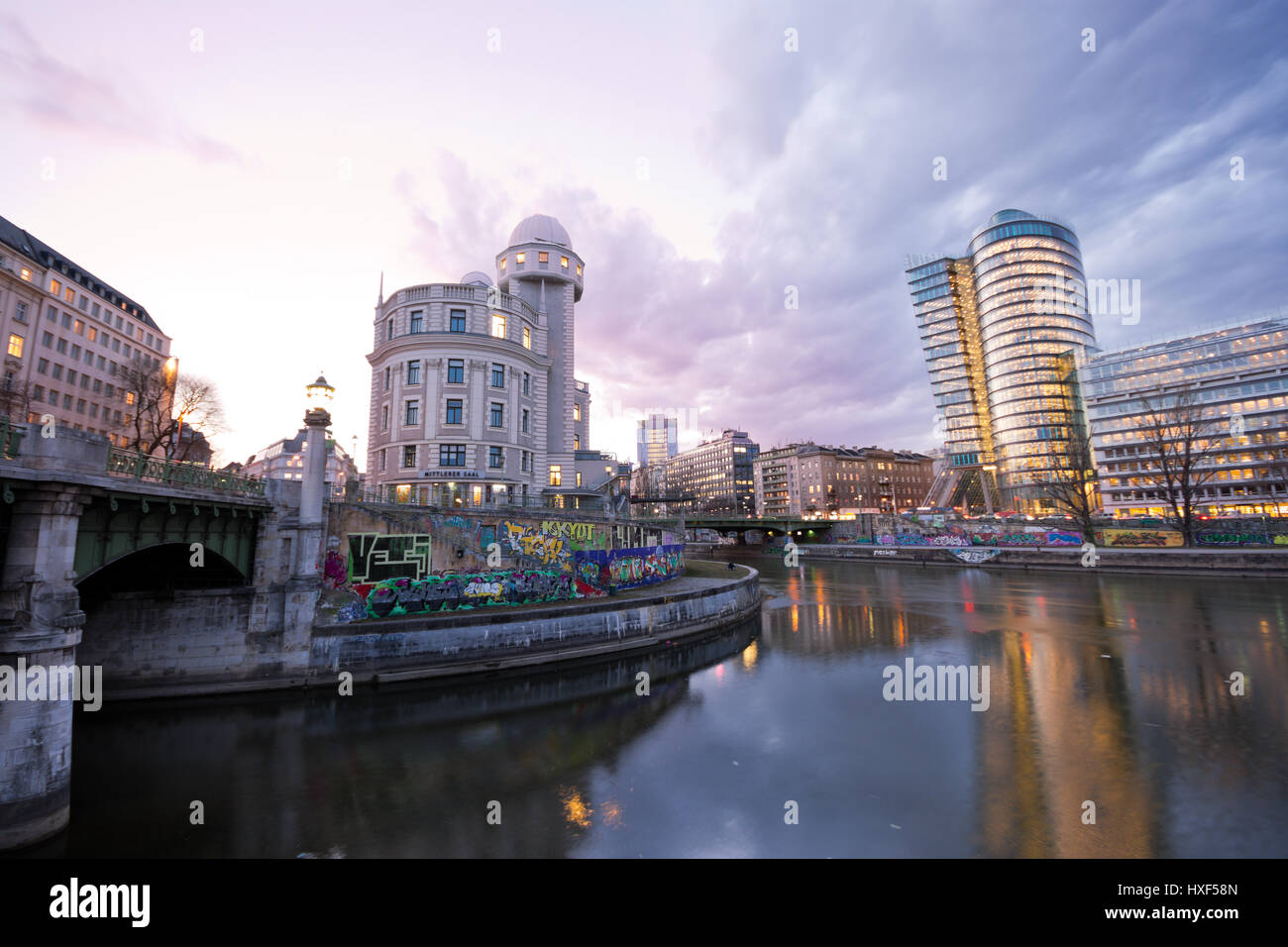 Urania, historical observatory in Vienna, Austria. Illuminated Uniqa ...
