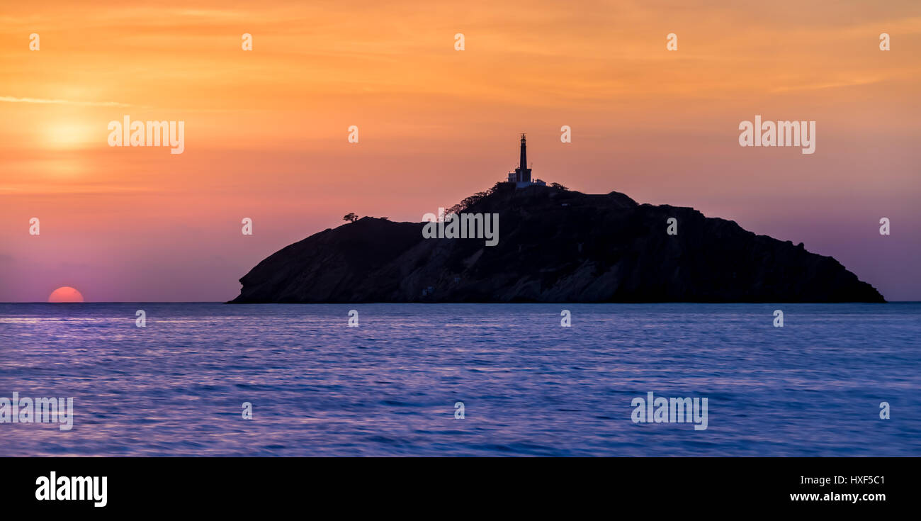 Sunset view of a lighthouse in an island - Santa Marta, Colombia Stock ...