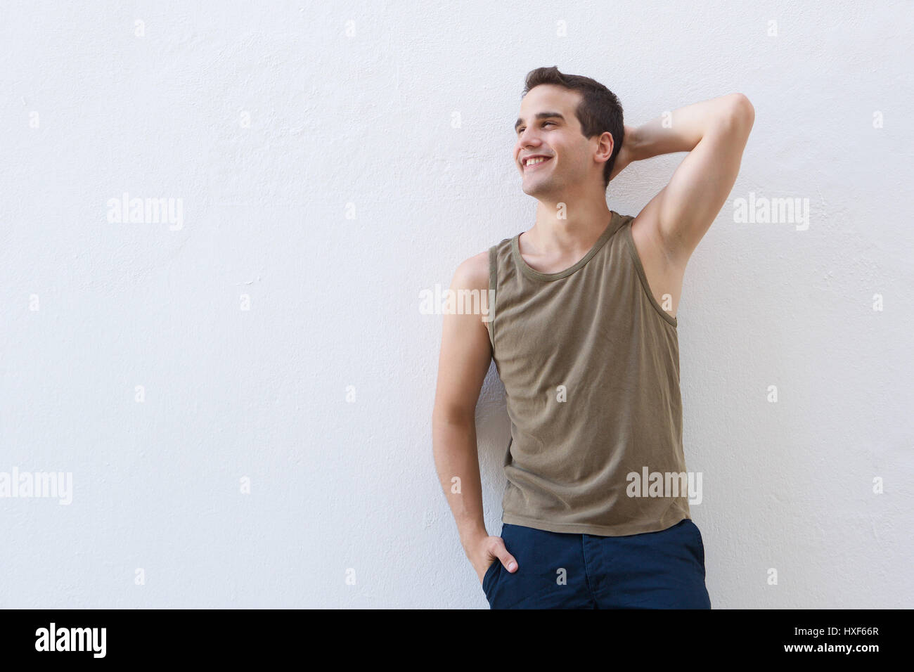 Portrait of a happy man standing against white background Stock Photo ...