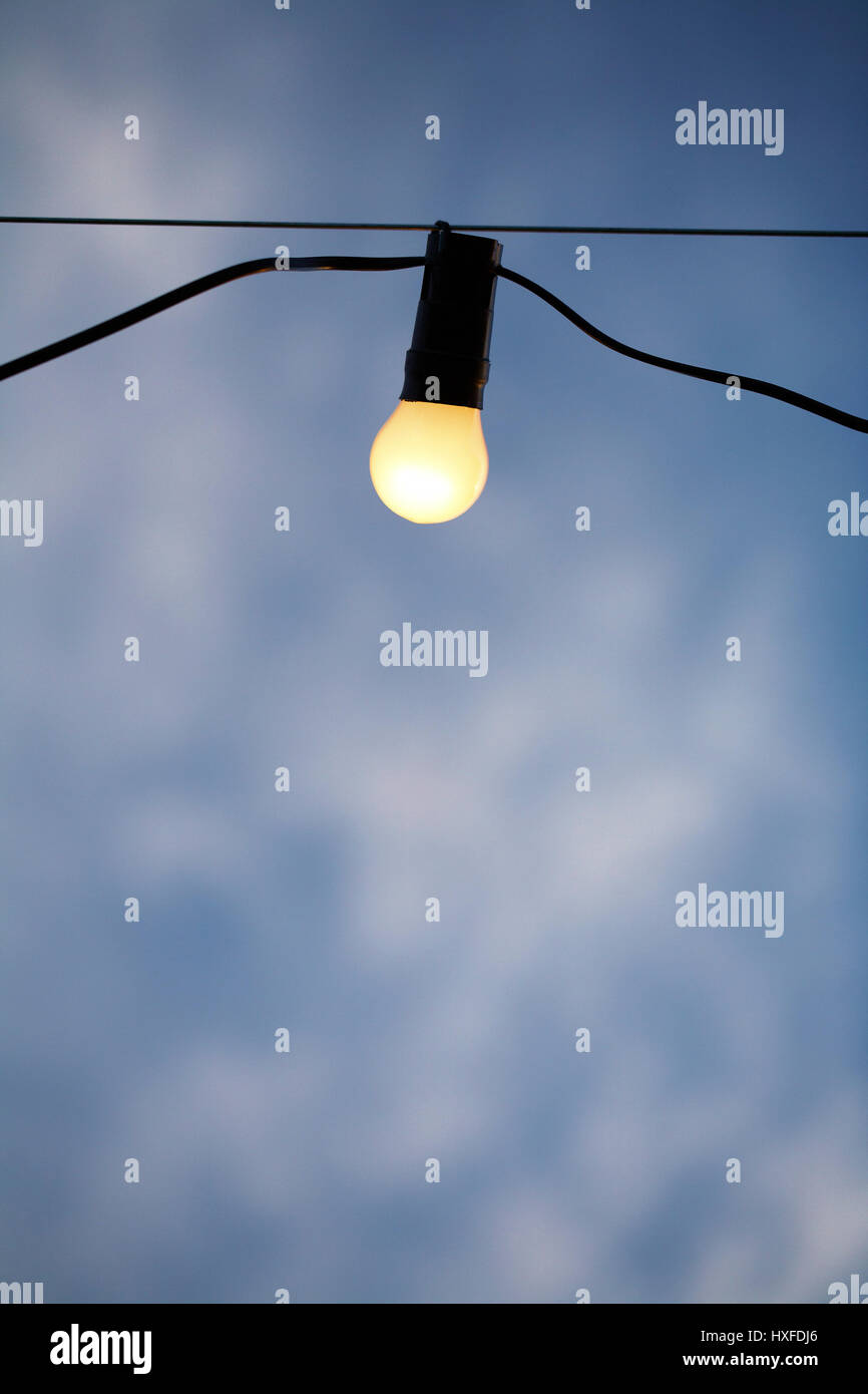 Single hanging festoon light Stock Photo - Alamy