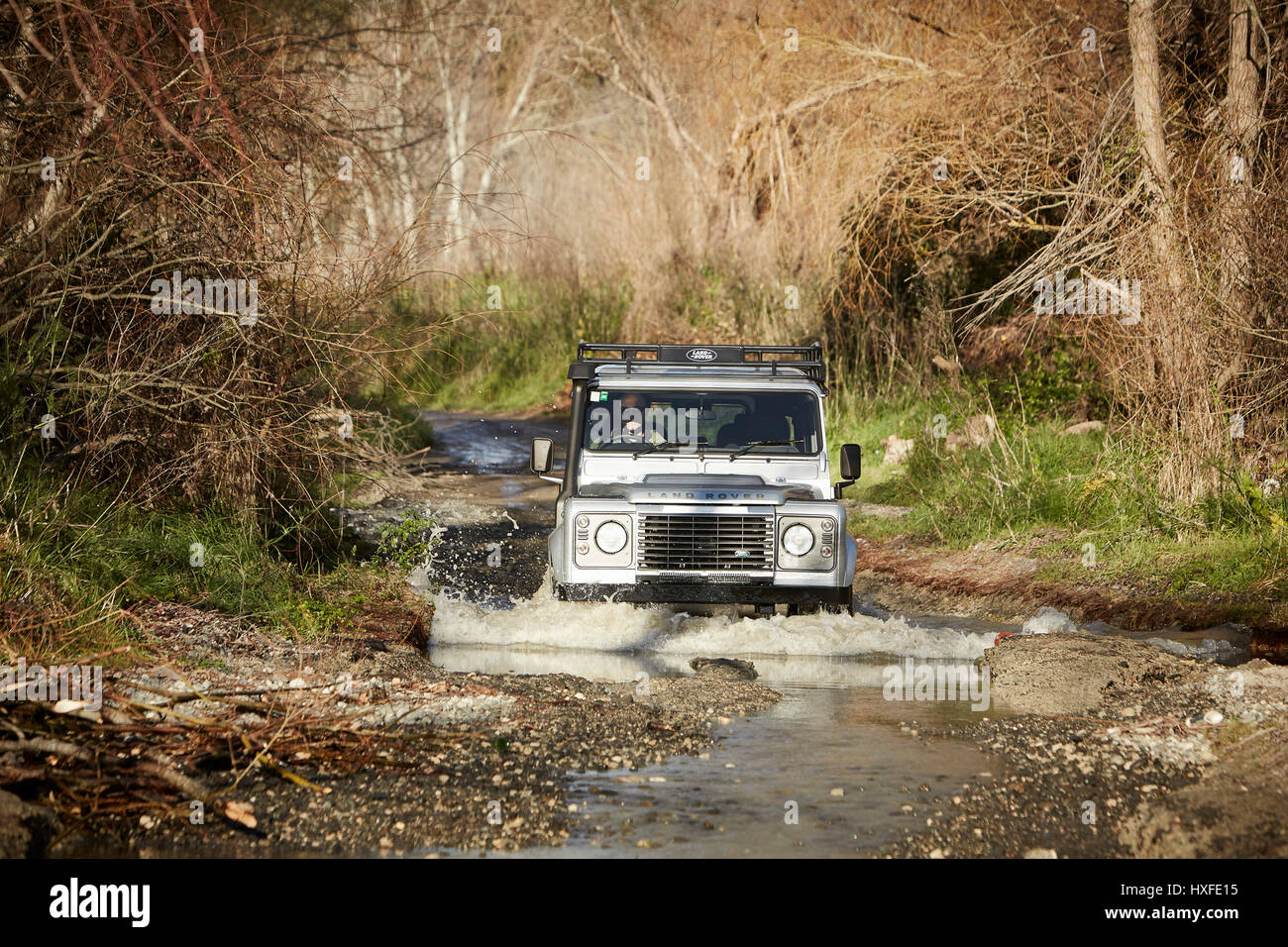 4x4 car driving through river hi-res stock photography and images - Alamy