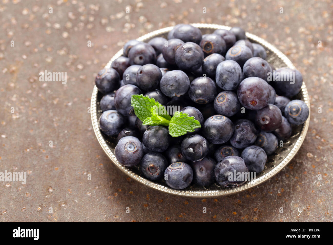 Ripe organic berry blueberries on a plate Stock Photo - Alamy