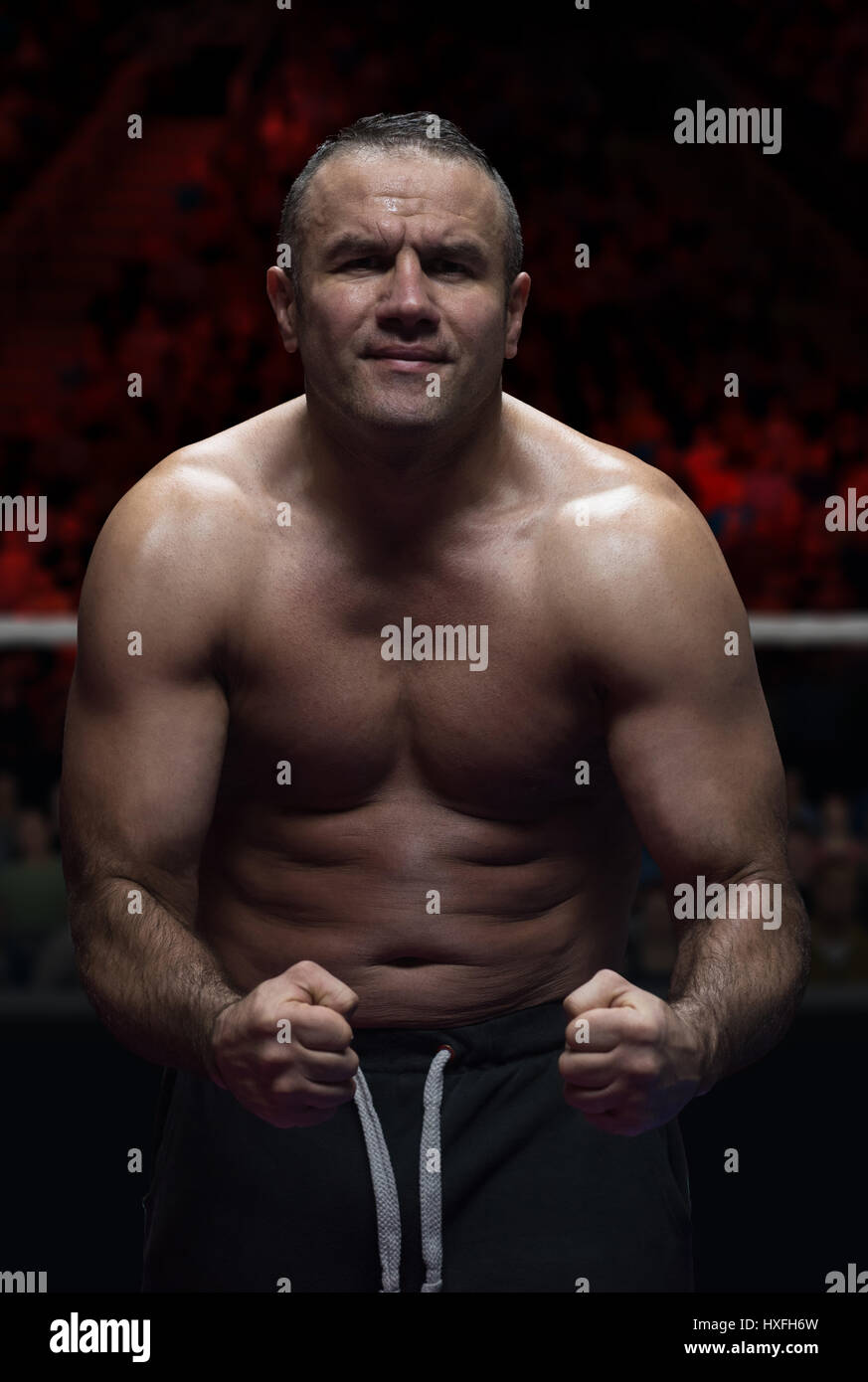 professional kickboxer with hands in martial arts position training for ...