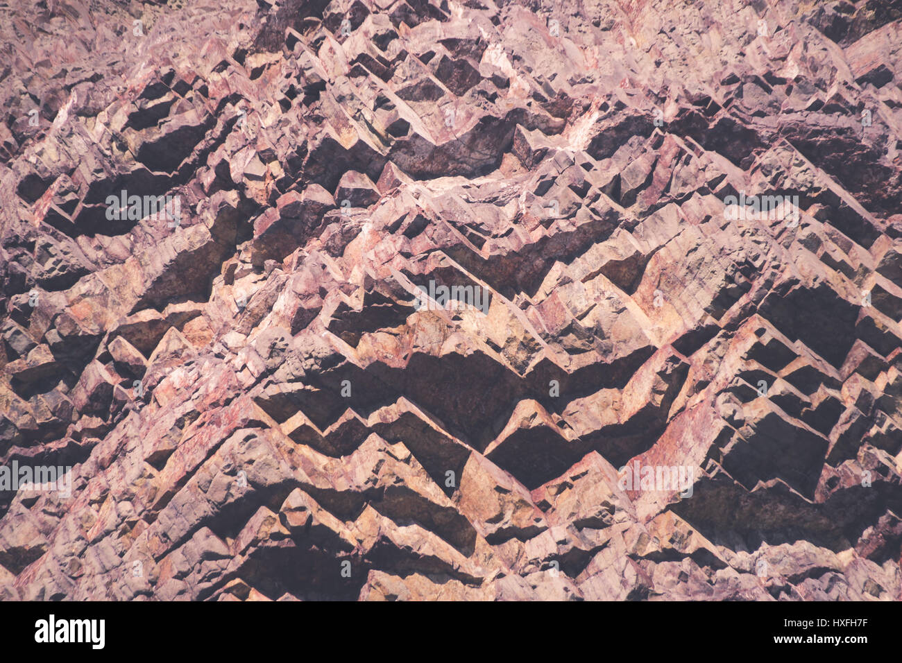 Photograph of a rock wall texture or background Stock Photo - Alamy