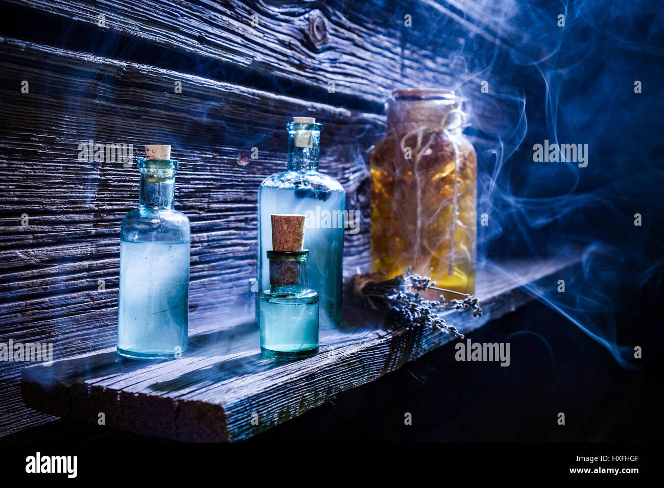 Magical witch lab full of blue potion for Halloween Stock Photo - Alamy