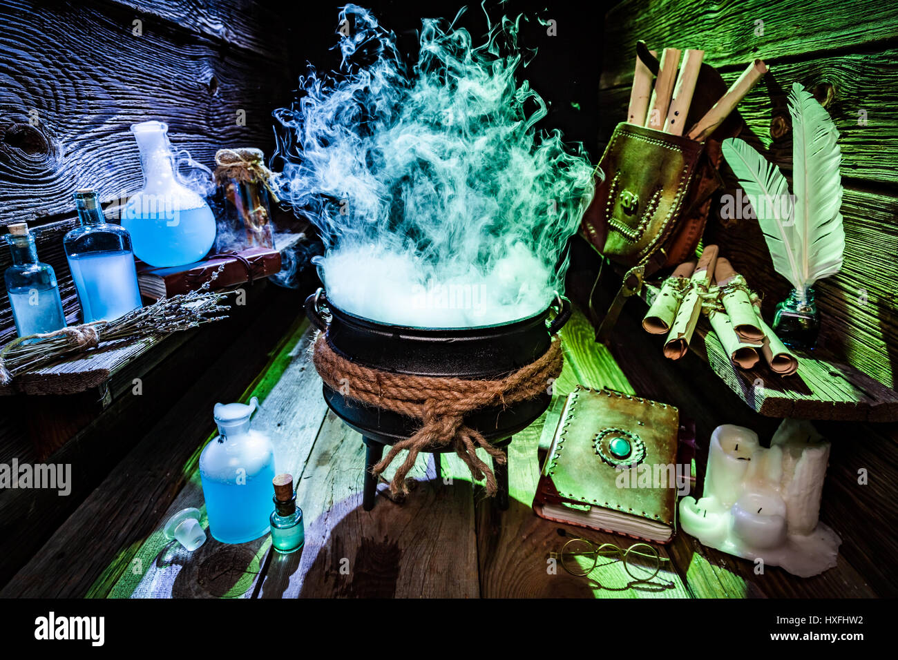 Mysterious witch pot with blue and green smoke for Halloween Stock ...