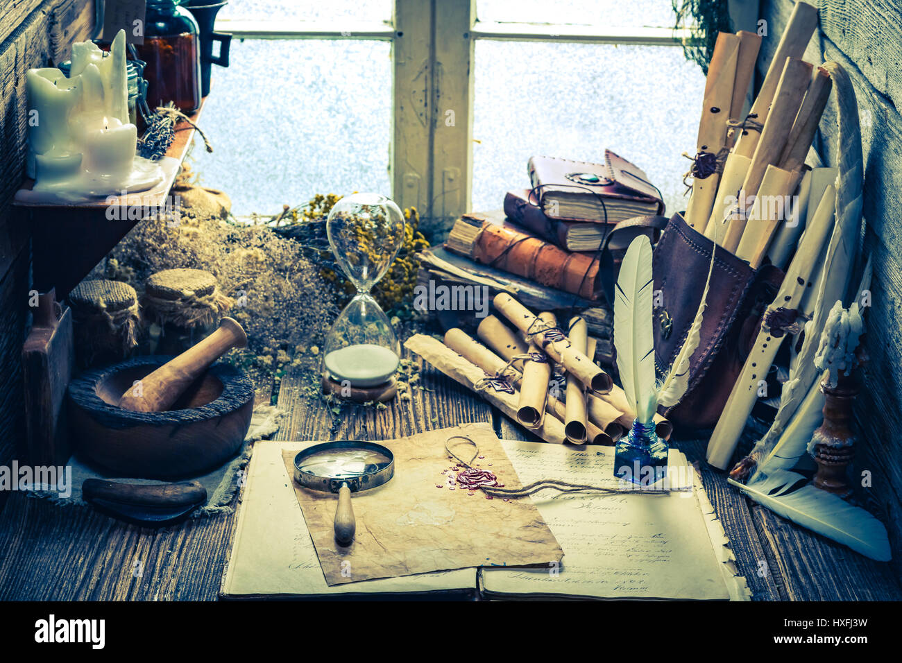Magical witch library full of scrolls and recipe Stock Photo - Alamy