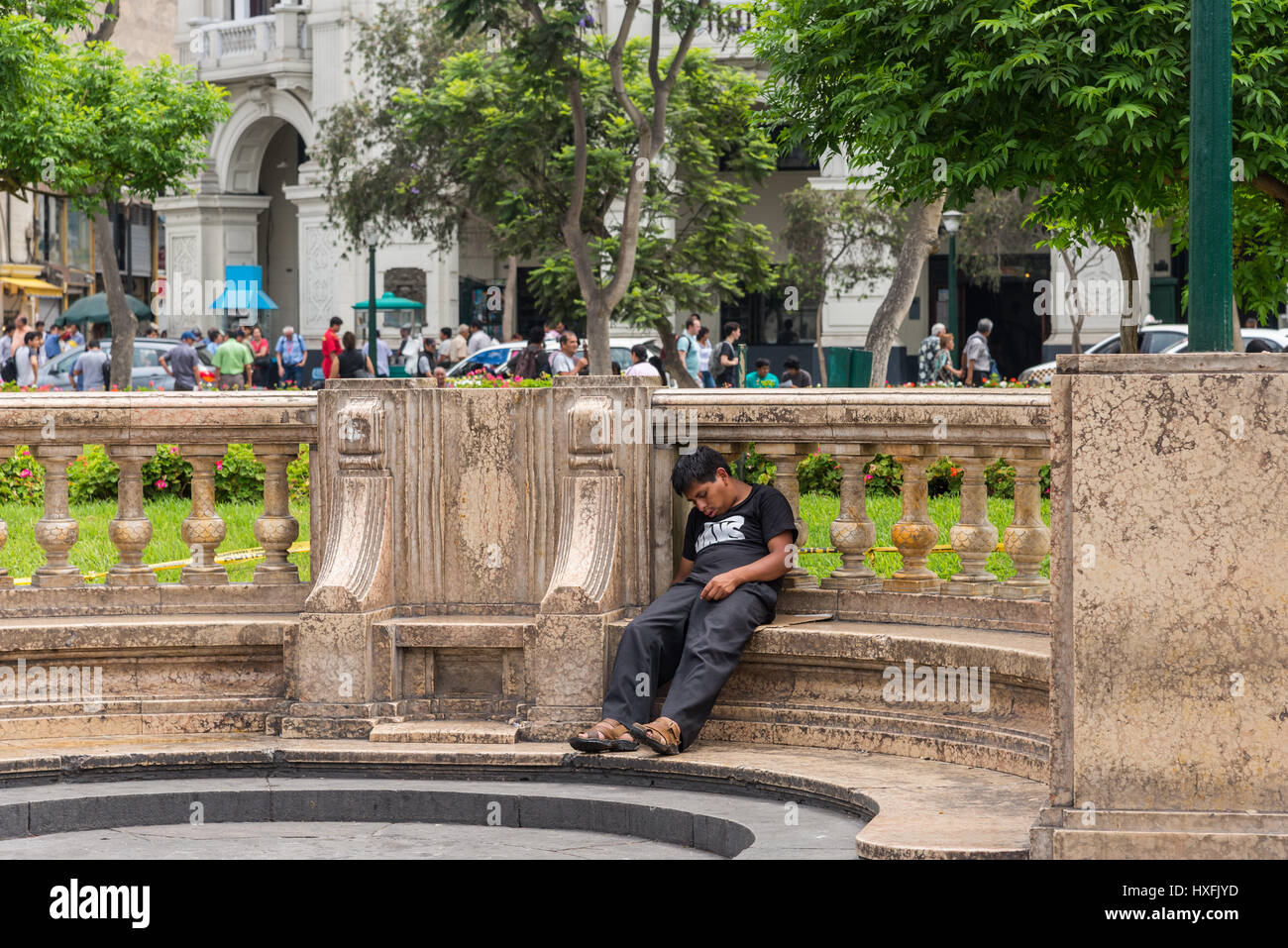 A man sleeping on the marble bench in Historic Centre. Lima, Peru Stock ...