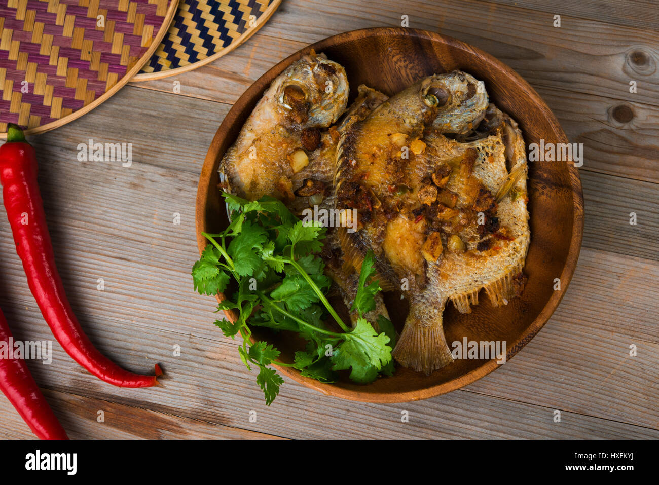 asian grilled fish top down view Stock Photo - Alamy