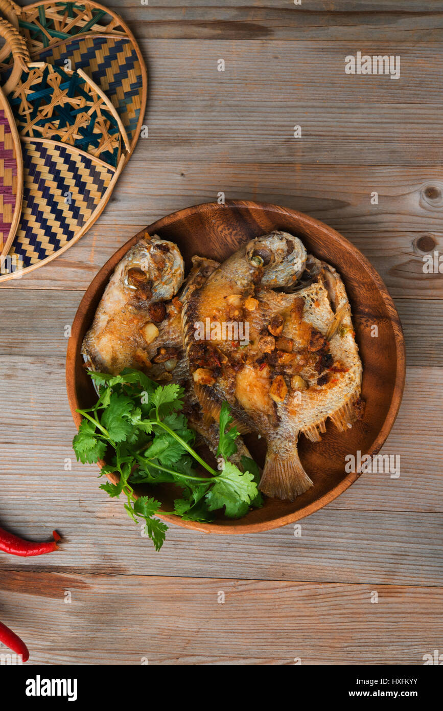 asian grilled fish top down view Stock Photo - Alamy