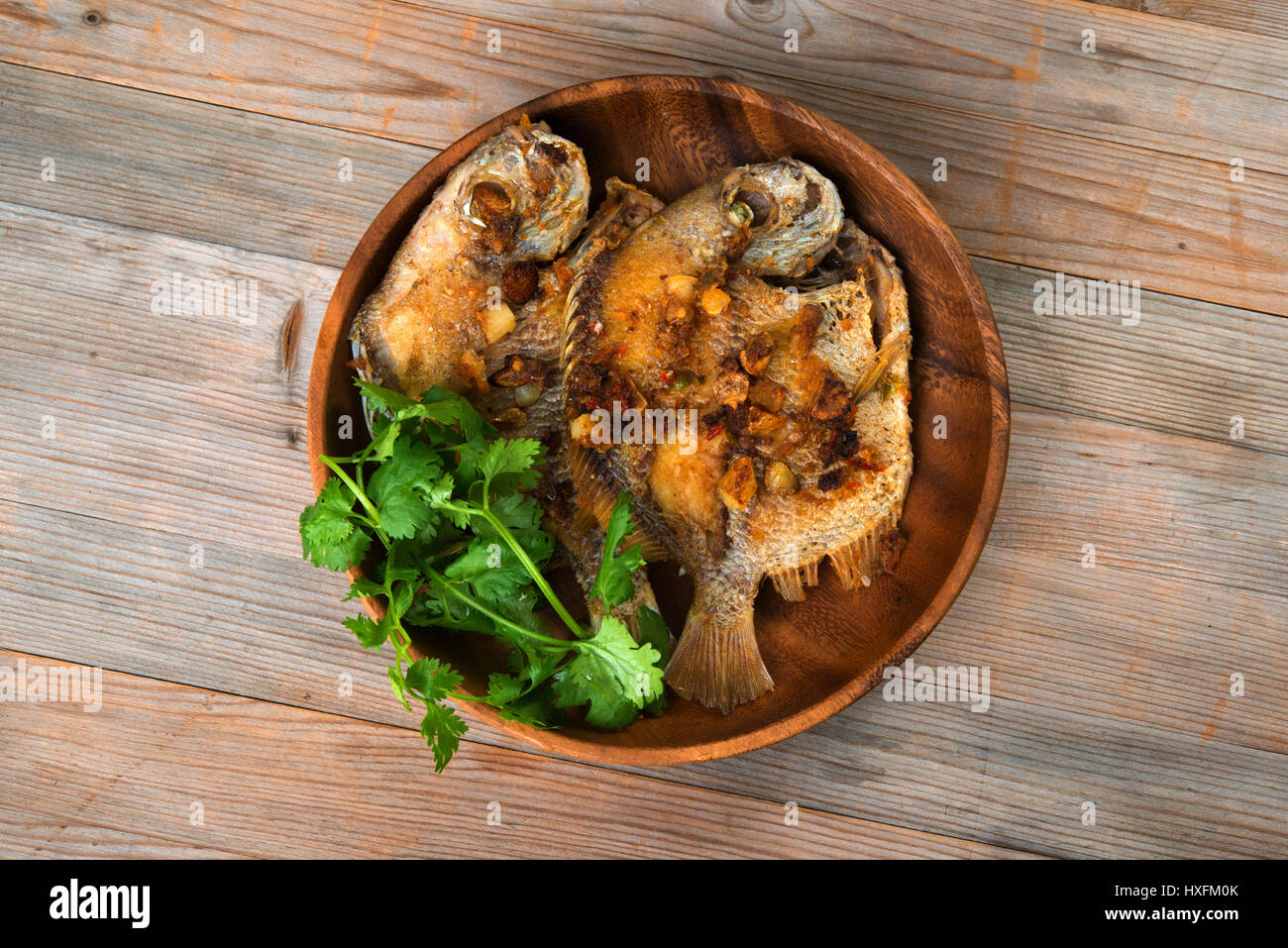 asian grilled fish top down view Stock Photo - Alamy