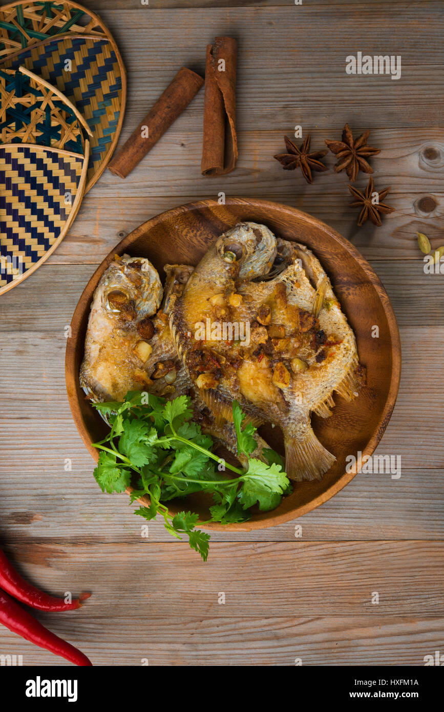asian grilled fish top down view Stock Photo - Alamy