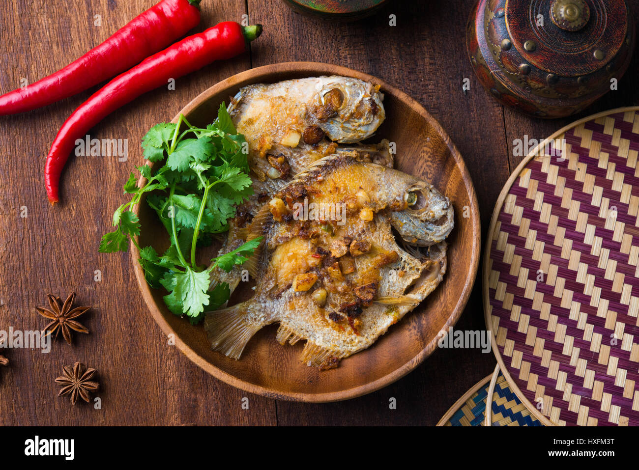 asian grilled fish top down view Stock Photo - Alamy
