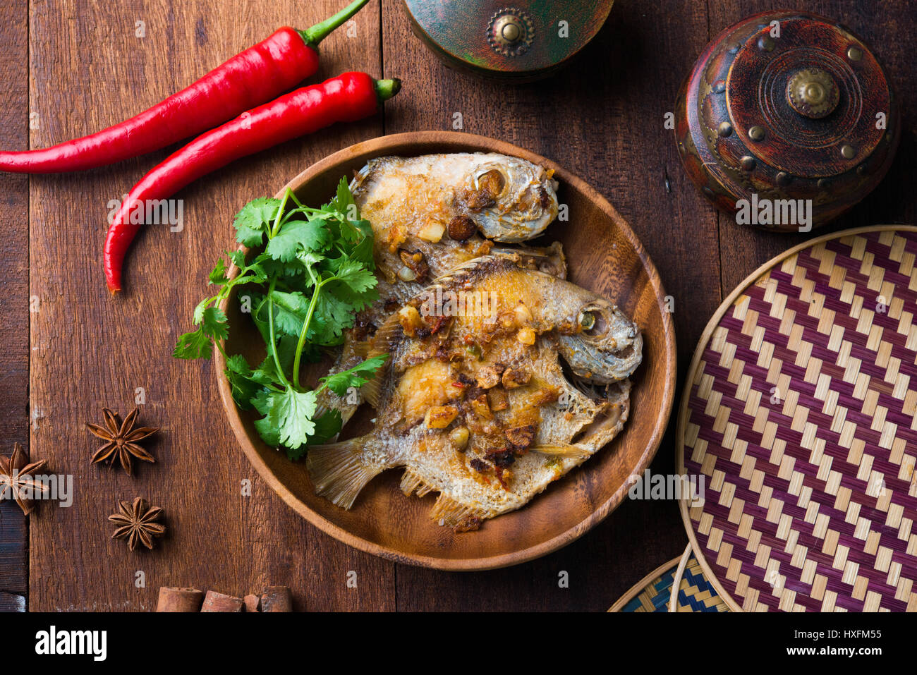 asian grilled fish top down view Stock Photo - Alamy