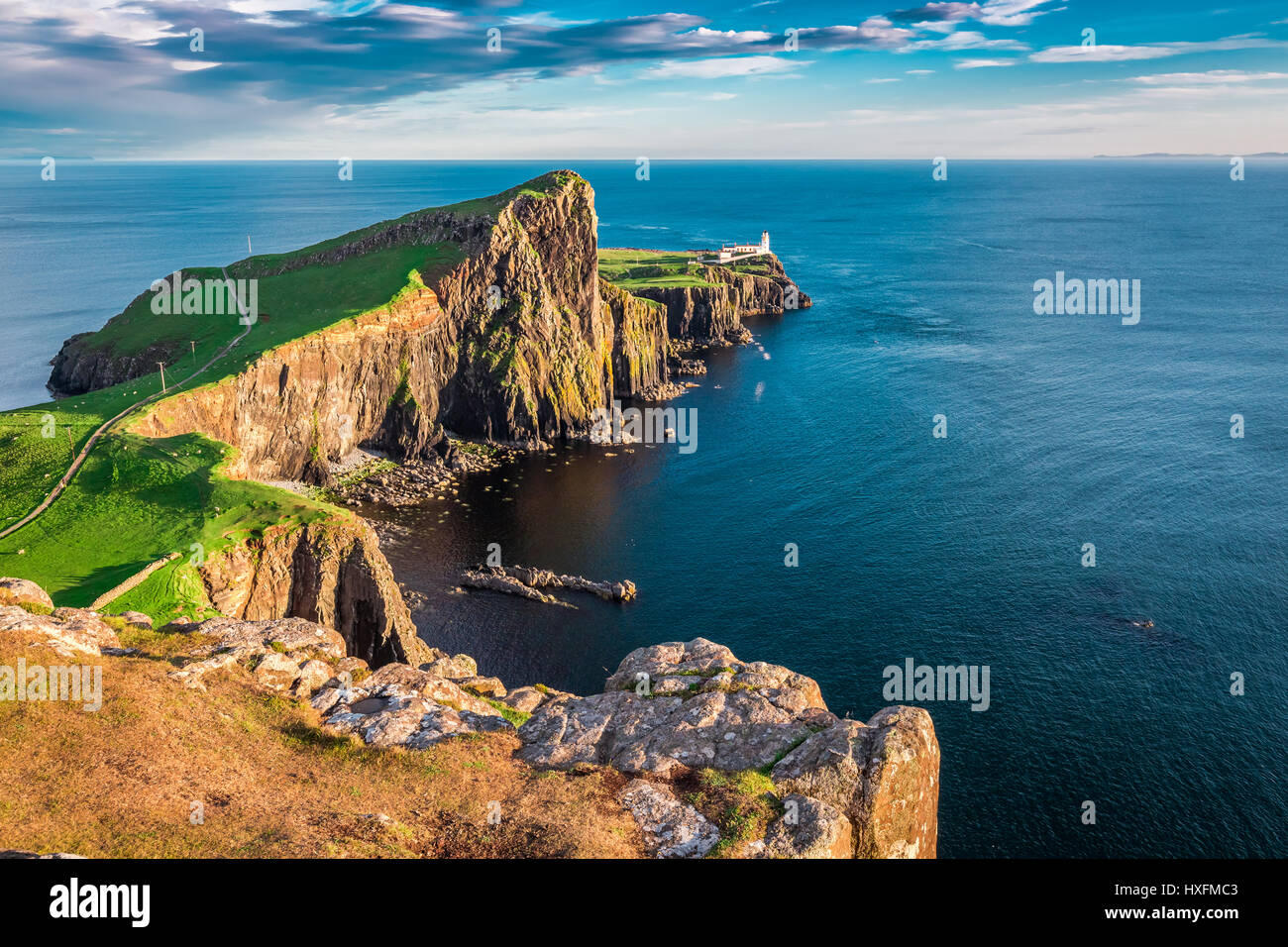 Beautiful sunset at the Neist point lighthouse, Scotland Stock Photo ...