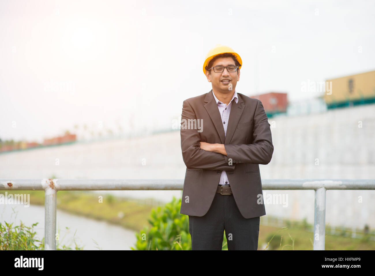 indian male engineer by the lakeside Stock Photo - Alamy