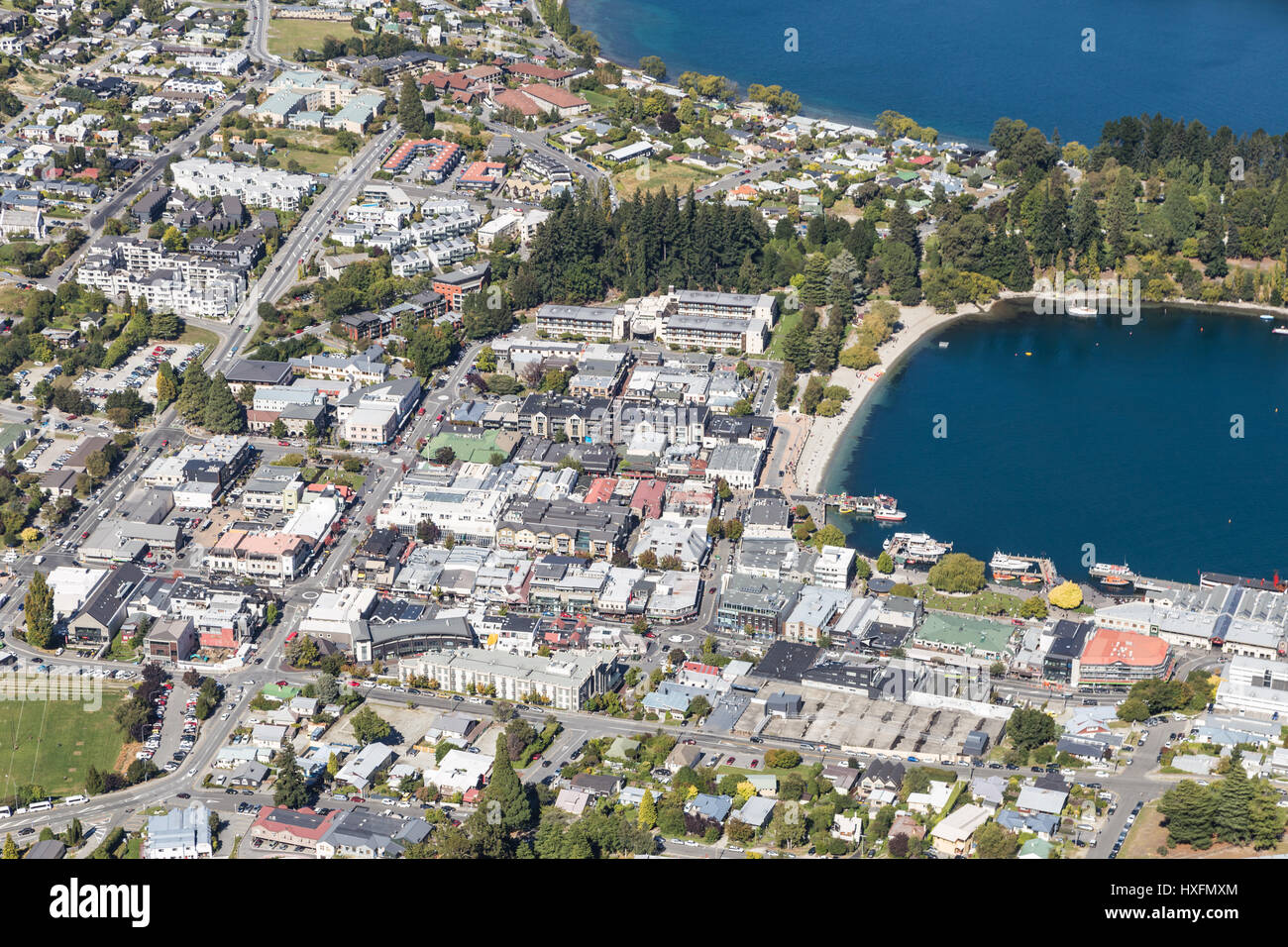 Aerial view of Queenstown city center and the Queentown bay by Lake ...
