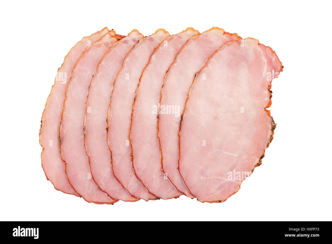 top view of slices of smoked pork loin ham arranged in a stack isolated ...