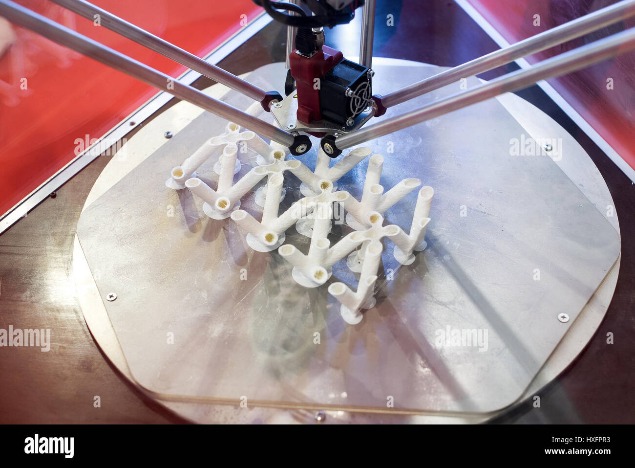 Process of creating white spatial grid structure on 3D printer, view of ...