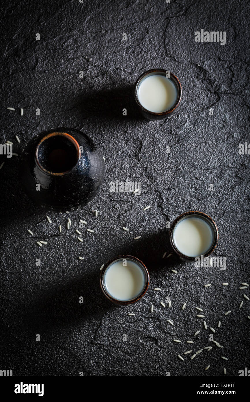 Strong sake in Asian restaurant on black rock Stock Photo - Alamy