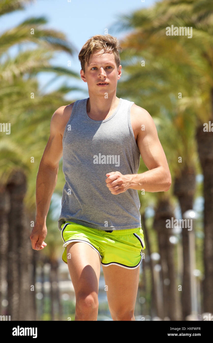 Fit young man running hi-res stock photography and images - Alamy