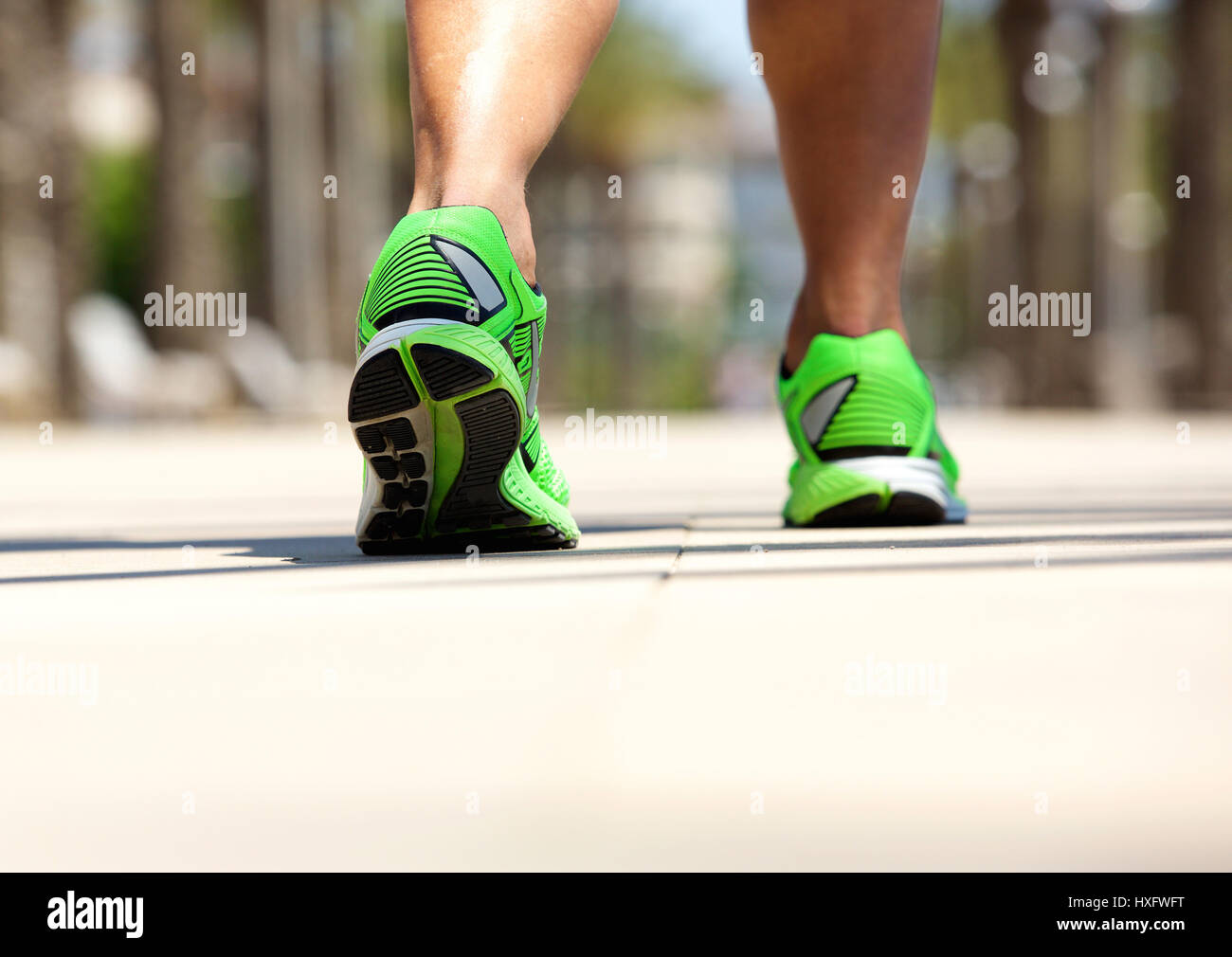 Fit young man walking alone hi-res stock photography and images - Alamy