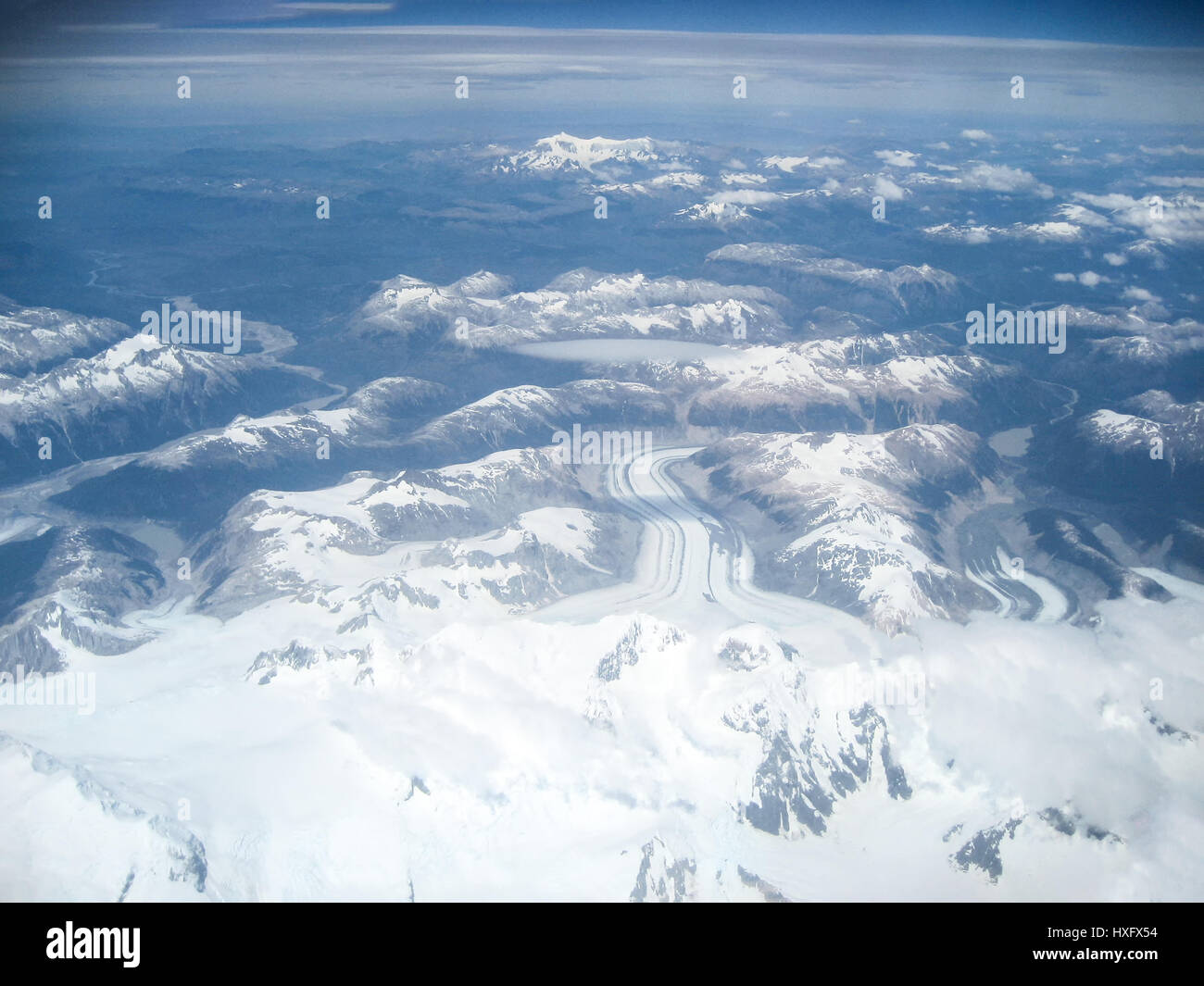 Spectacular aerial view taken while flying over the peaks and glaciers ...