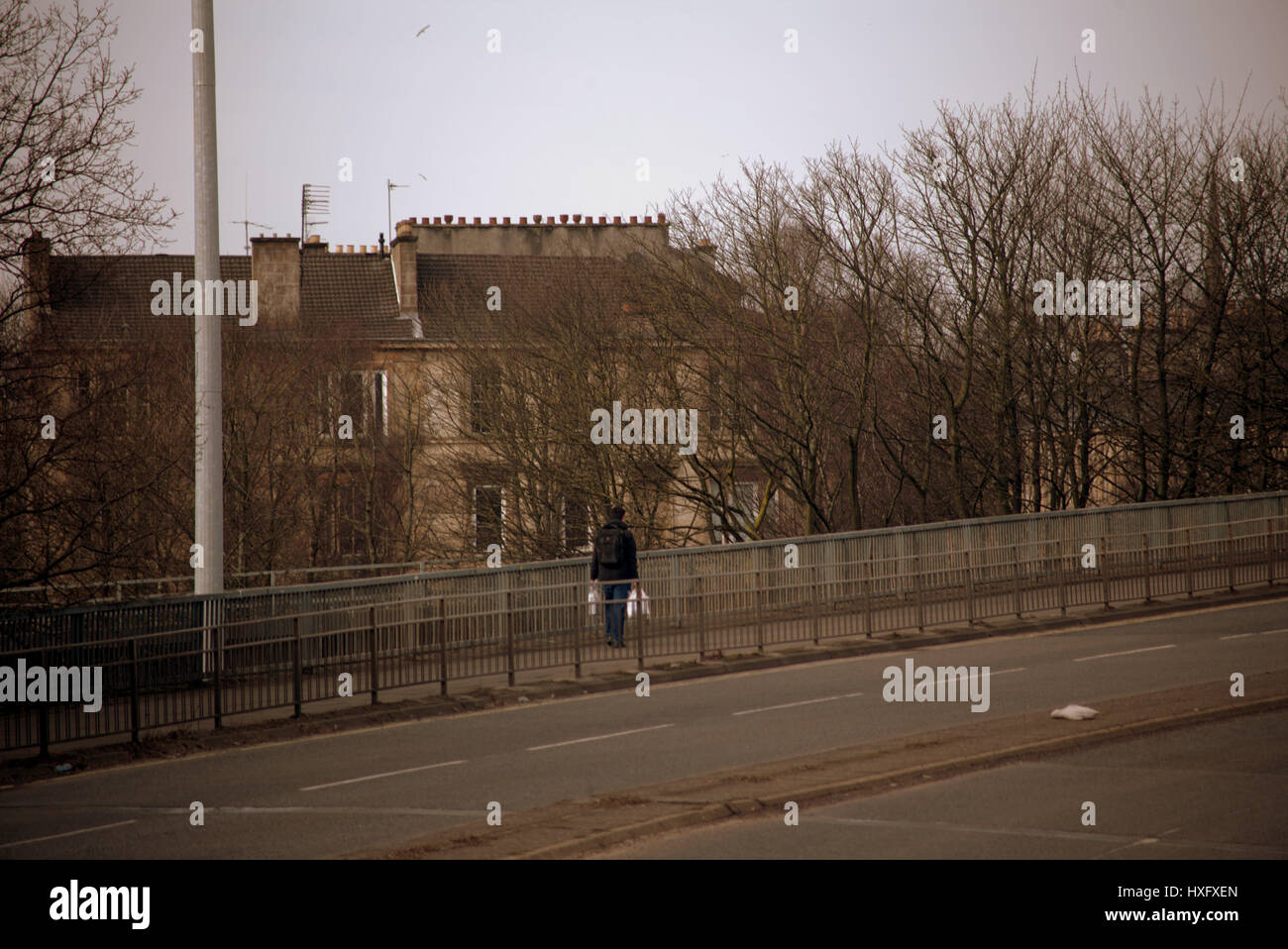 cityscape individual alone walking hairmless Stock Photo - Alamy