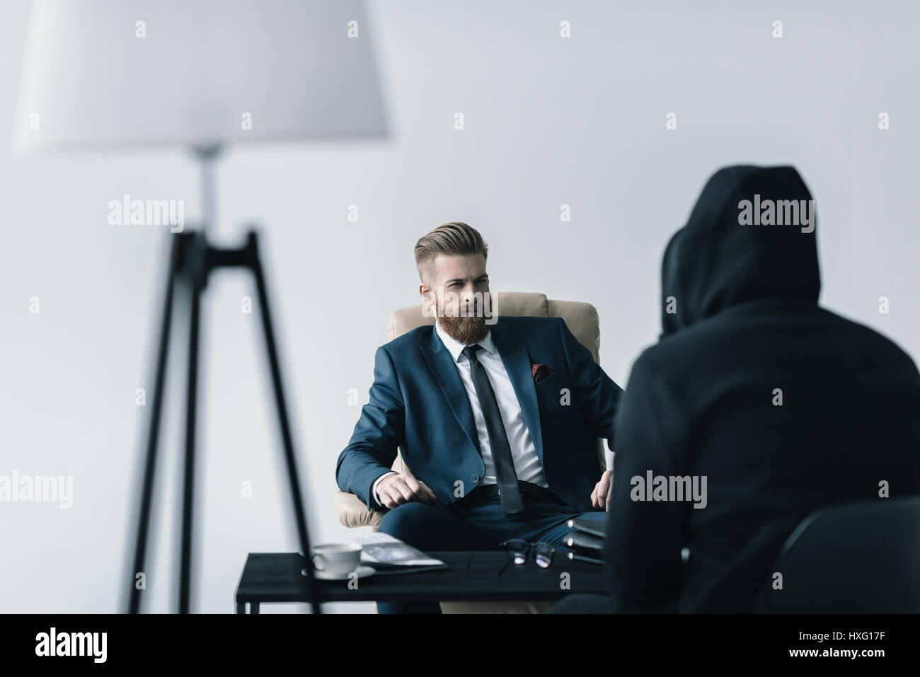 Anonymous person in black hi-res stock photography and images - Alamy