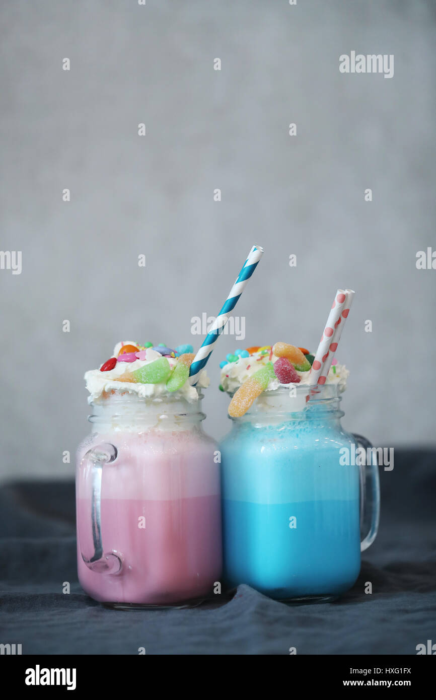 Glass pink milkshake decorated candy hi-res stock photography and ...