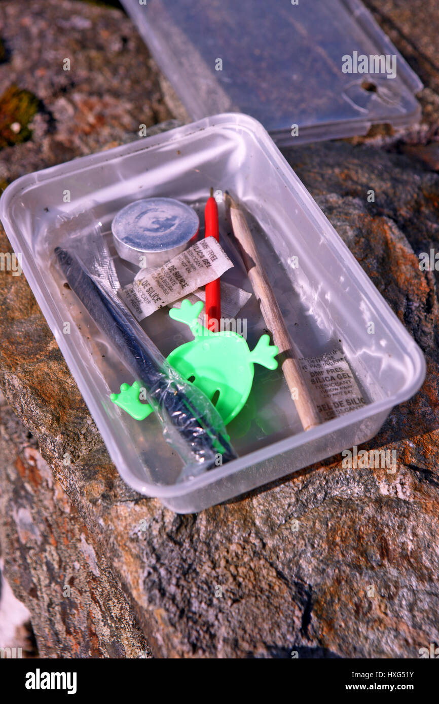 Geocaching waterproof container pen pencil and some trinkets at Tom na ...