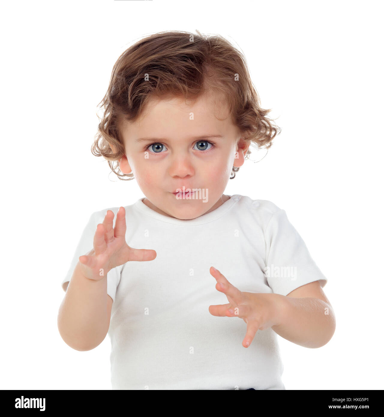 Funny baby giving a scare isolated on a white background Stock Photo ...