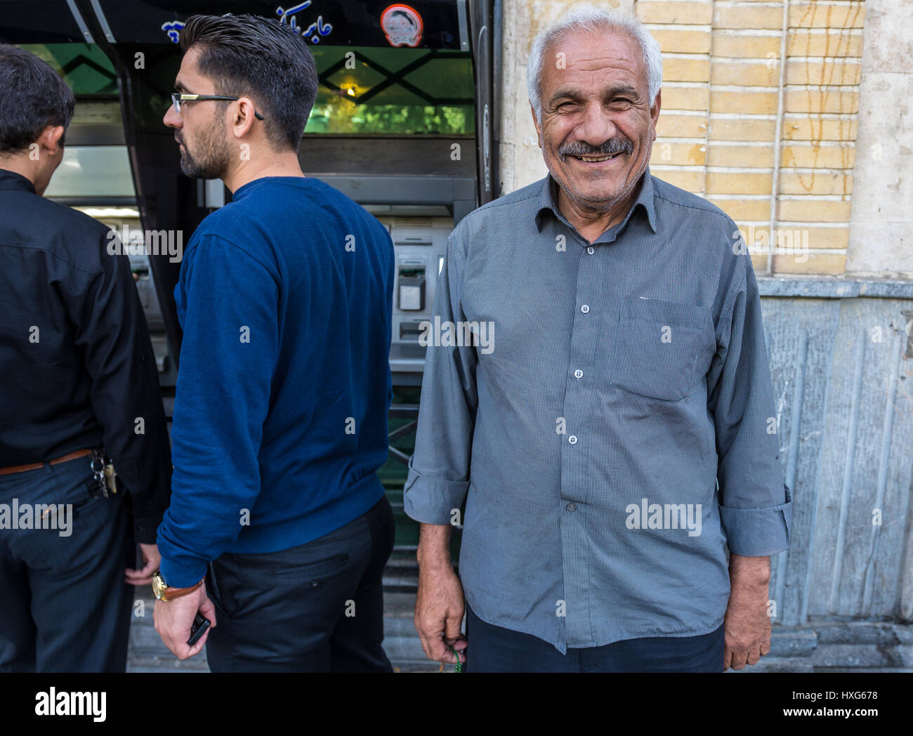 Iranian man posing for photo in Tehran city, capital of Iran and Tehran ...