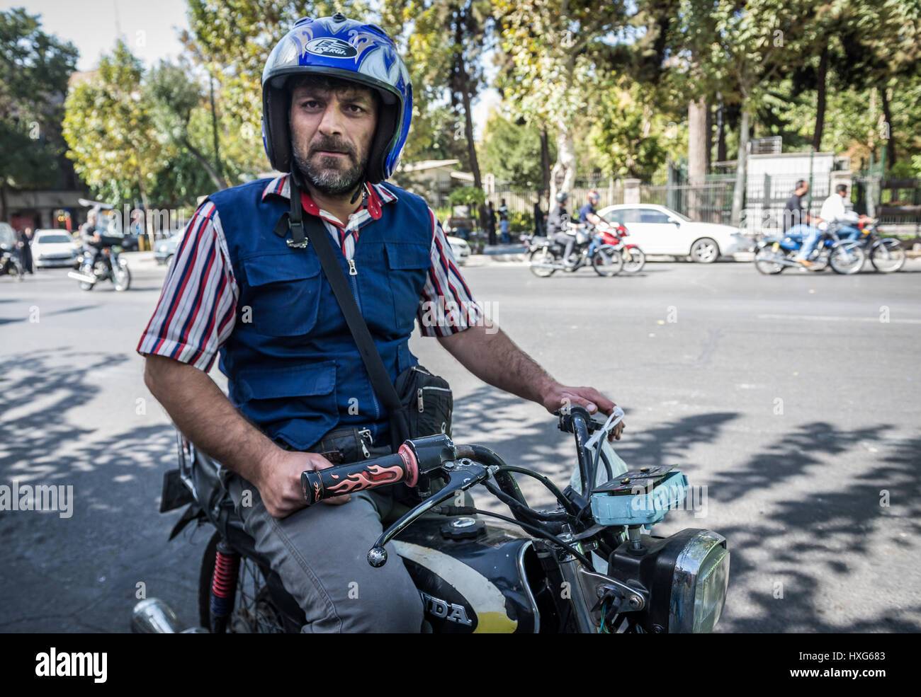 Iranian man posing for photo on a street in Tehran city, capital of ...
