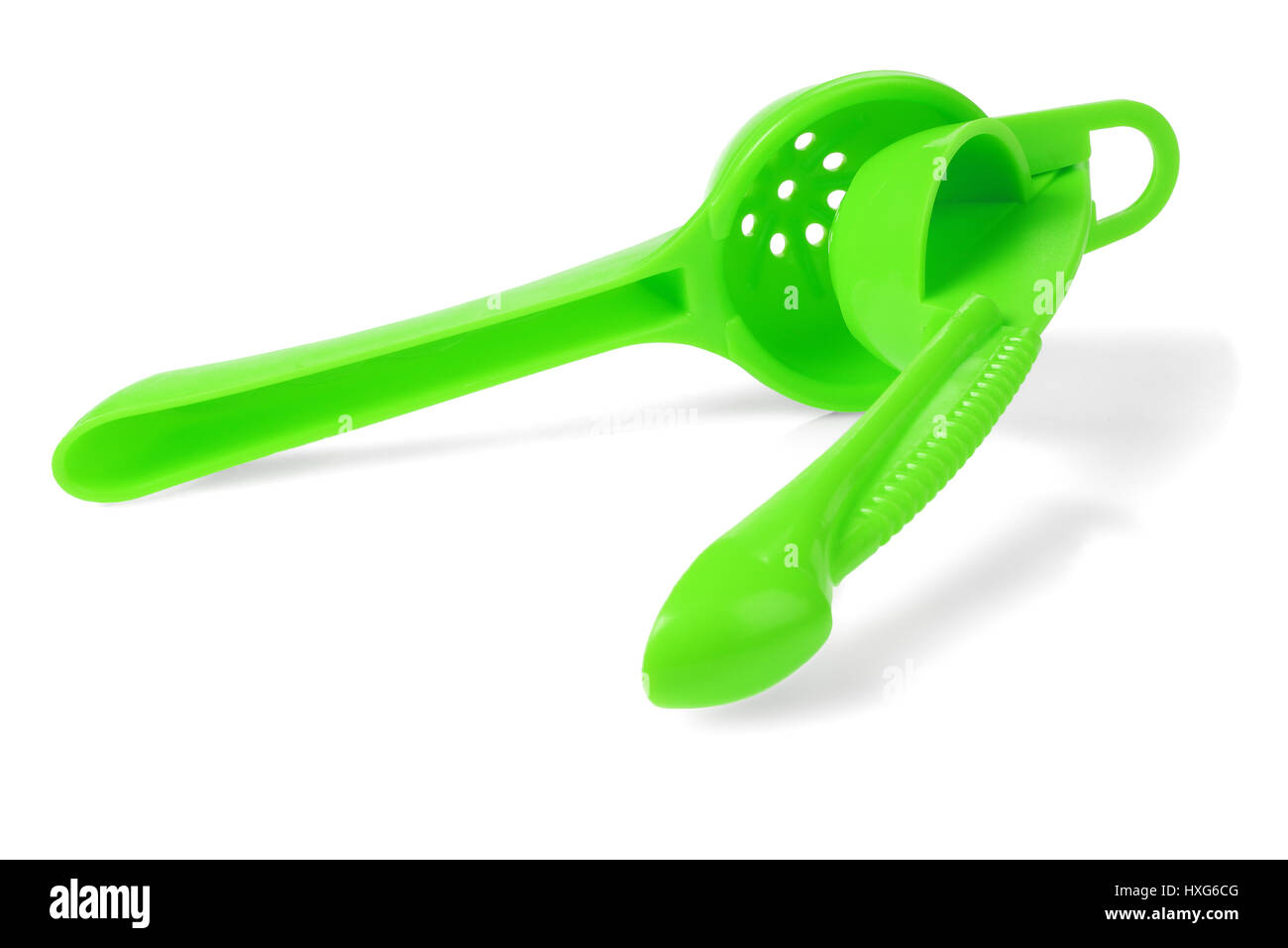 Hand Held Plastic Lemon Squeezer on White Background Stock Photo - Alamy