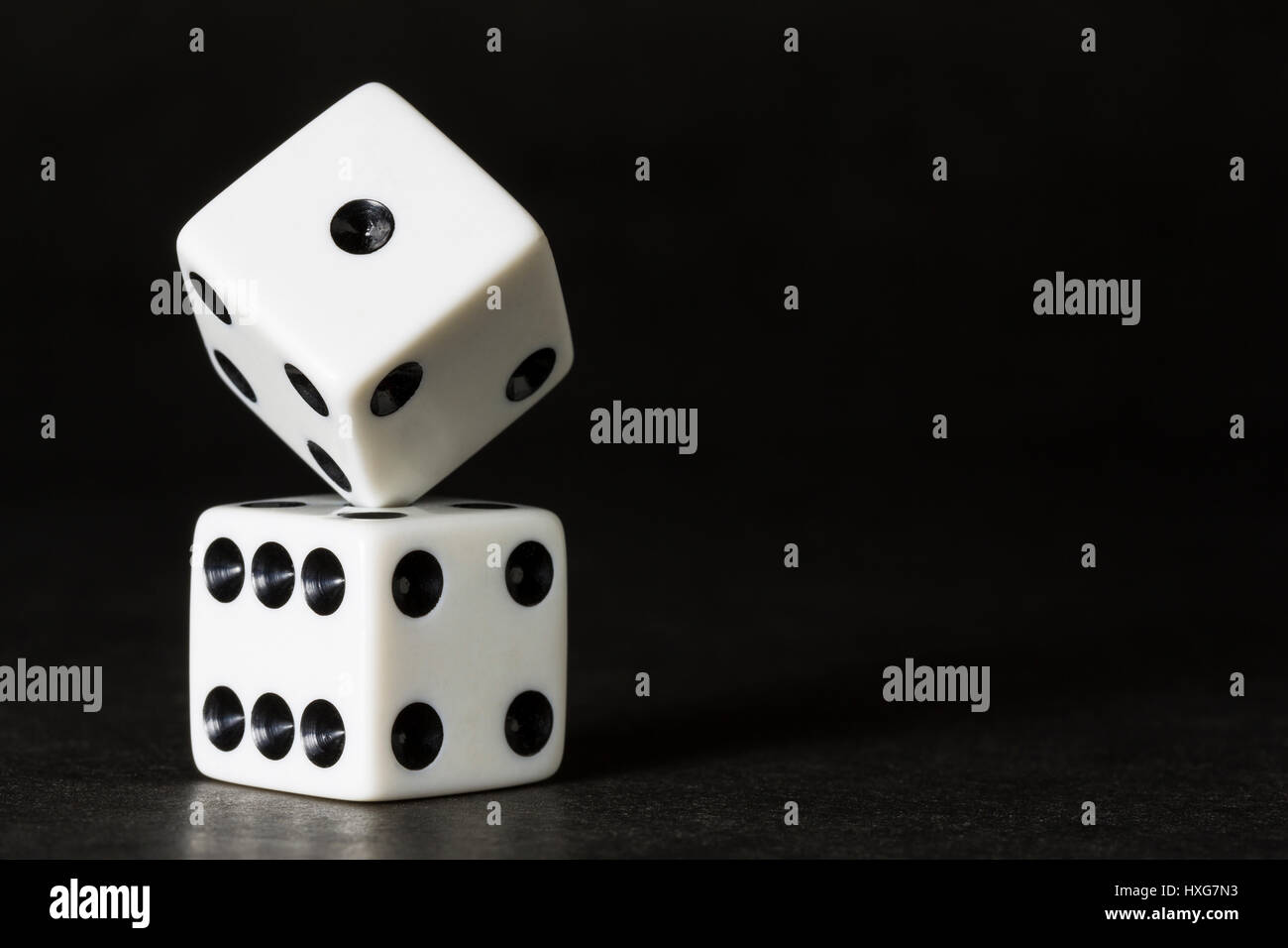 Balanced White Dice Formation Stock Photo - Alamy