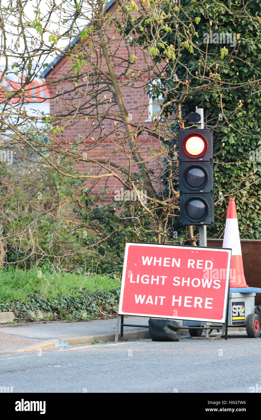 Red light shows wait sign hi-res stock photography and images - Alamy