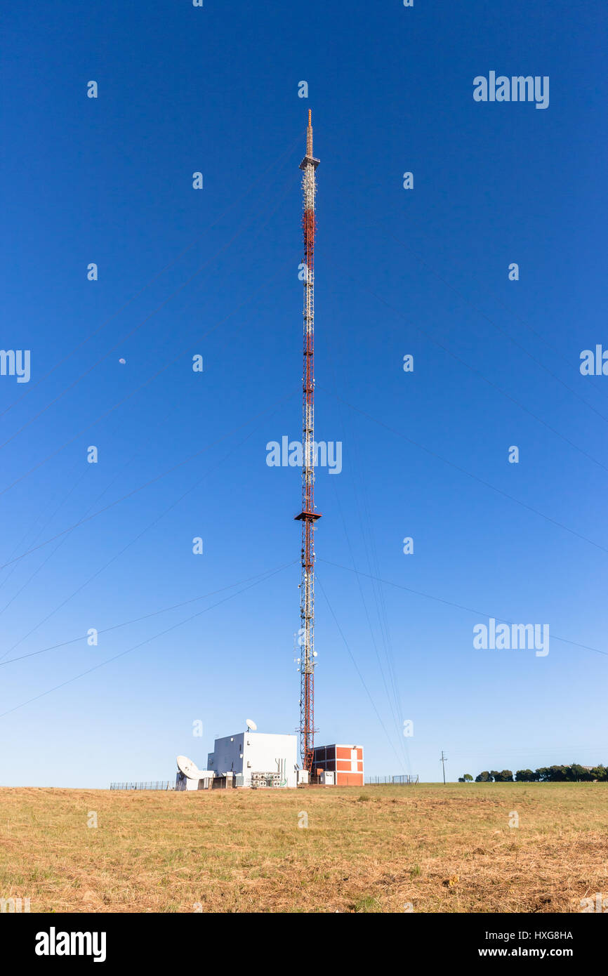 Communications signal tower tall high structure on highground hilltop ...
