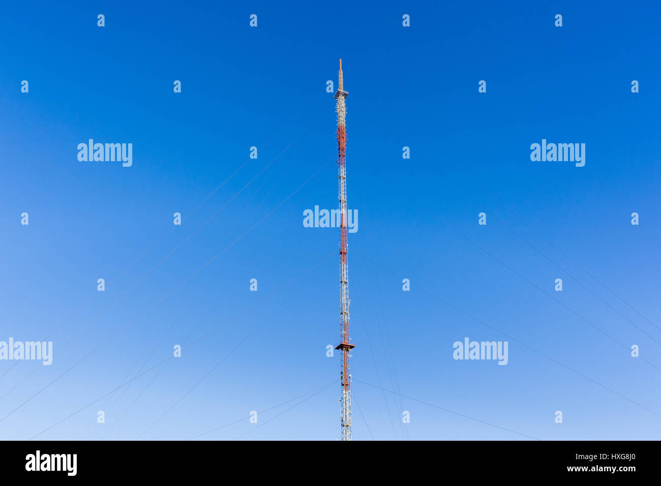 Communications signal tower tall high structure on highground hilltop ...