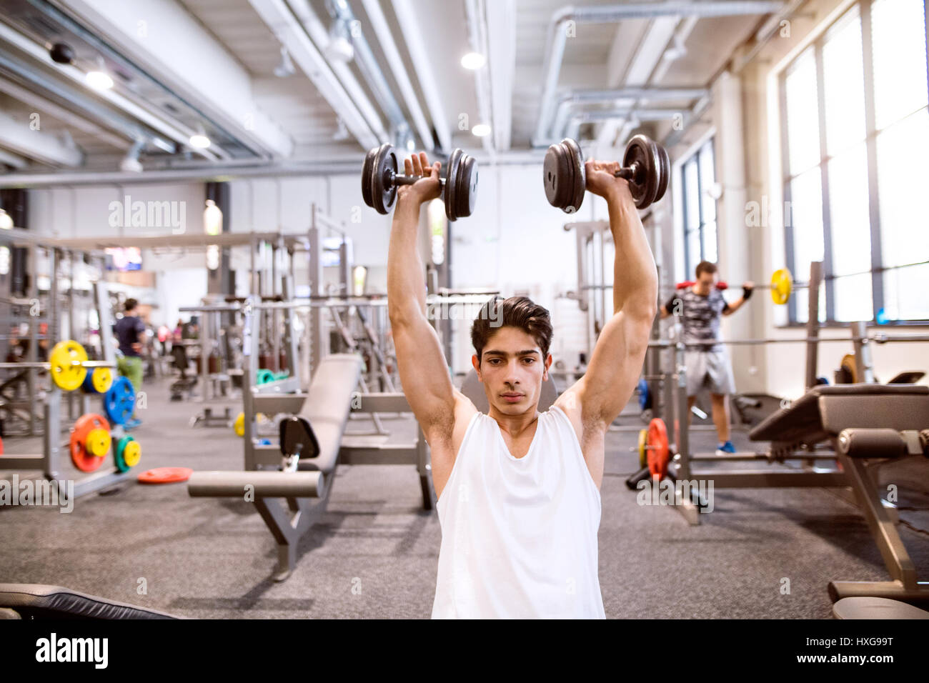 Handsome bodybuilder sitting on bench hi-res stock photography and ...
