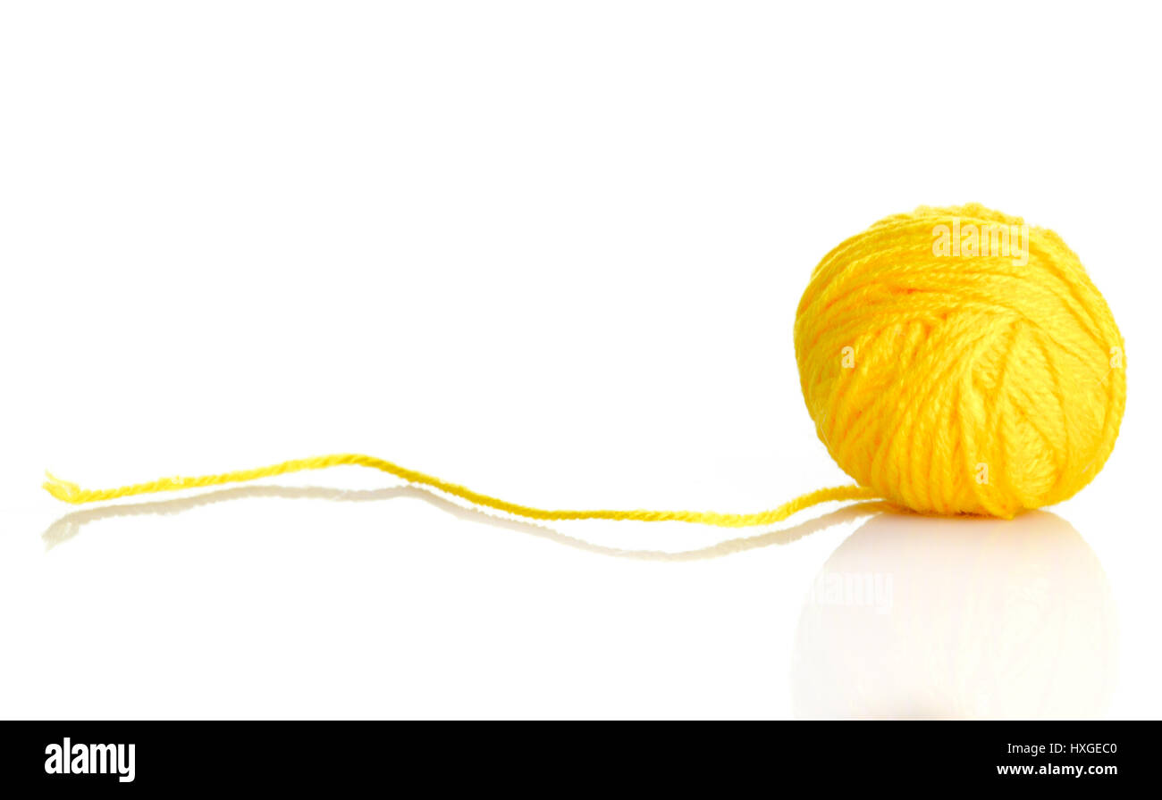 Yellow wool yarn ball isolated on white background Stock Photo - Alamy