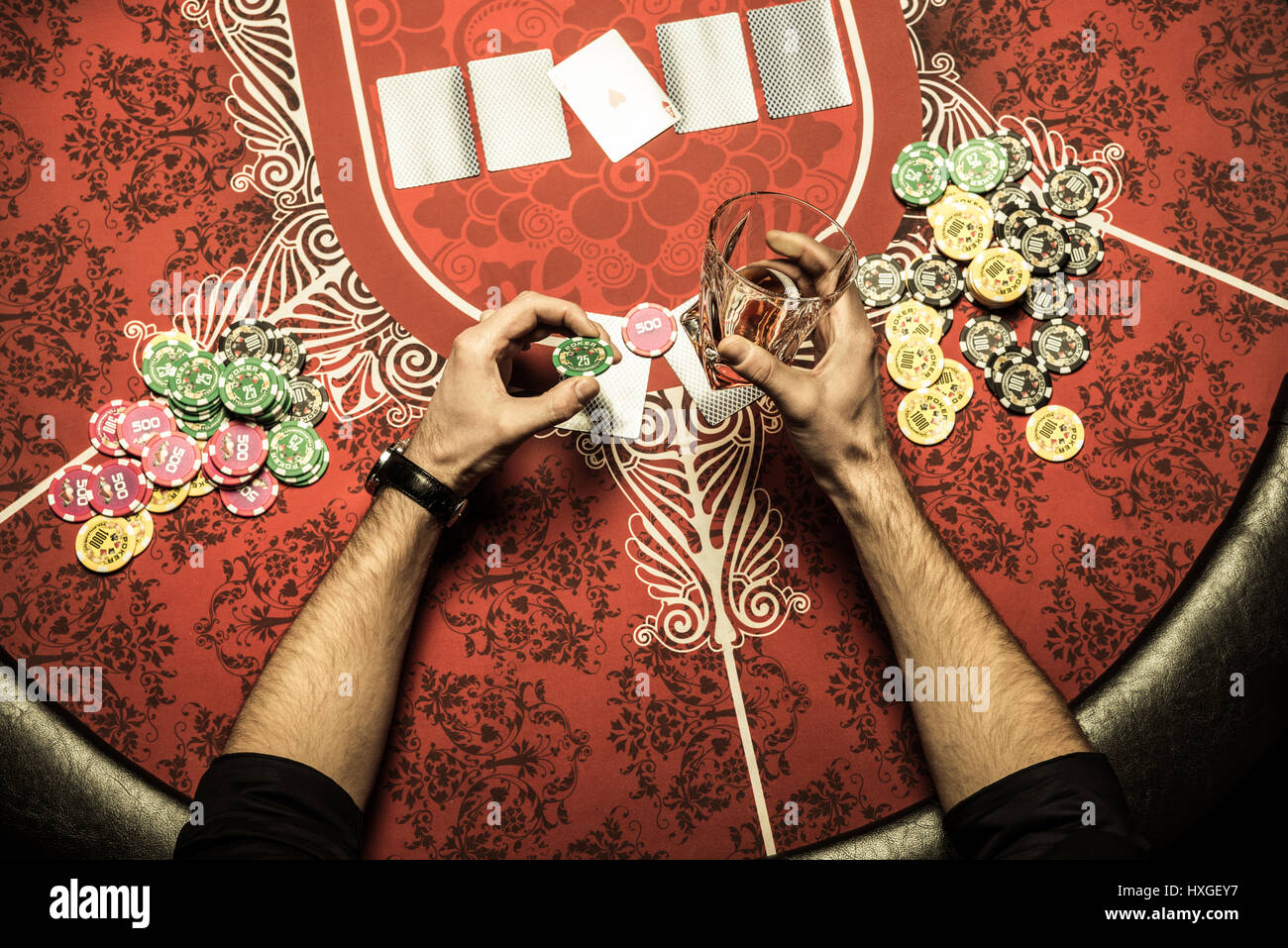 People sitting poker table playing hi-res stock photography and images ...