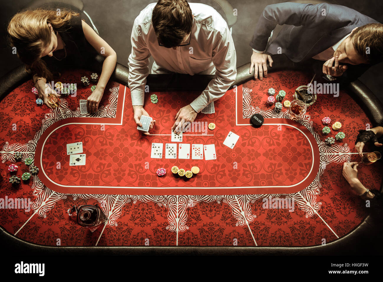 Men playing poker hi-res stock photography and images - Alamy