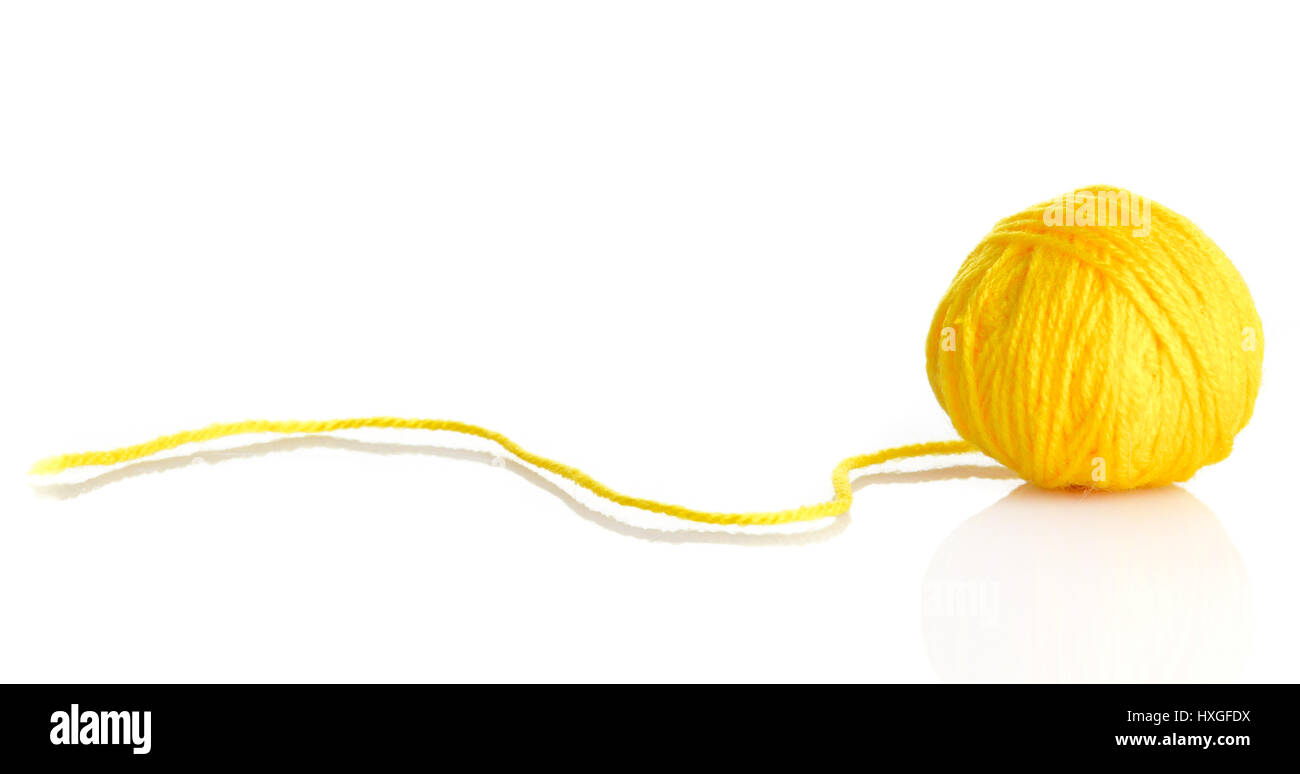 Yellow wool yarn ball isolated on white background Stock Photo - Alamy