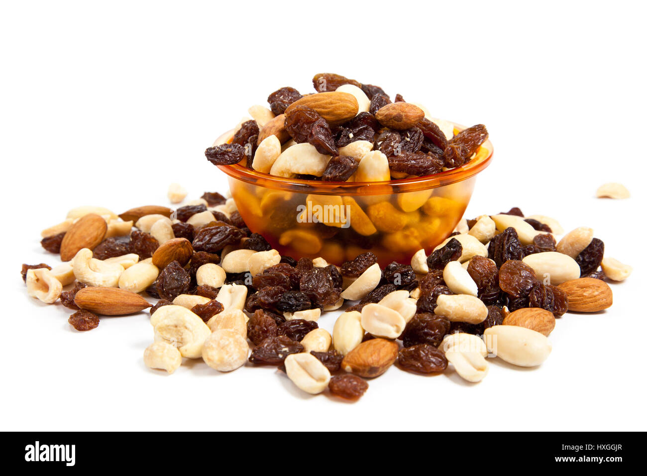 nuts and raisins isolated on white Stock Photo - Alamy
