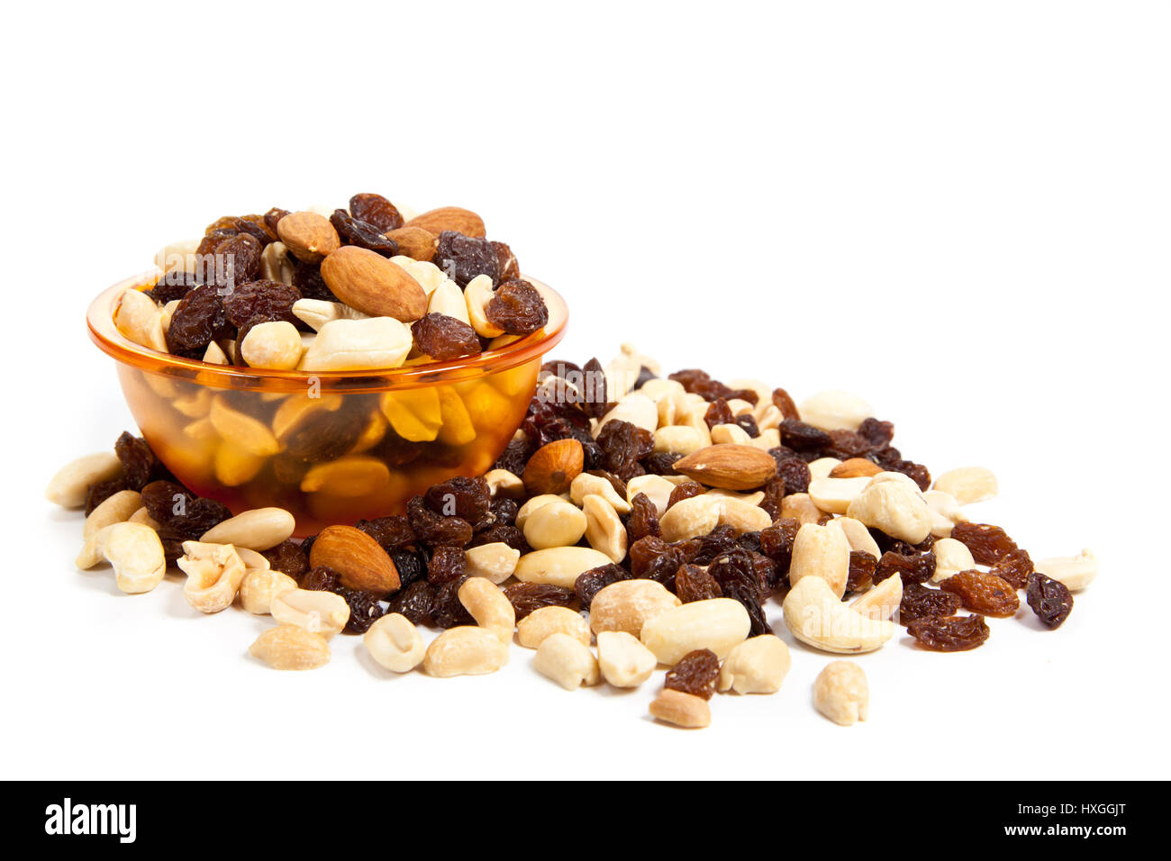 nuts and raisins isolated on white Stock Photo - Alamy
