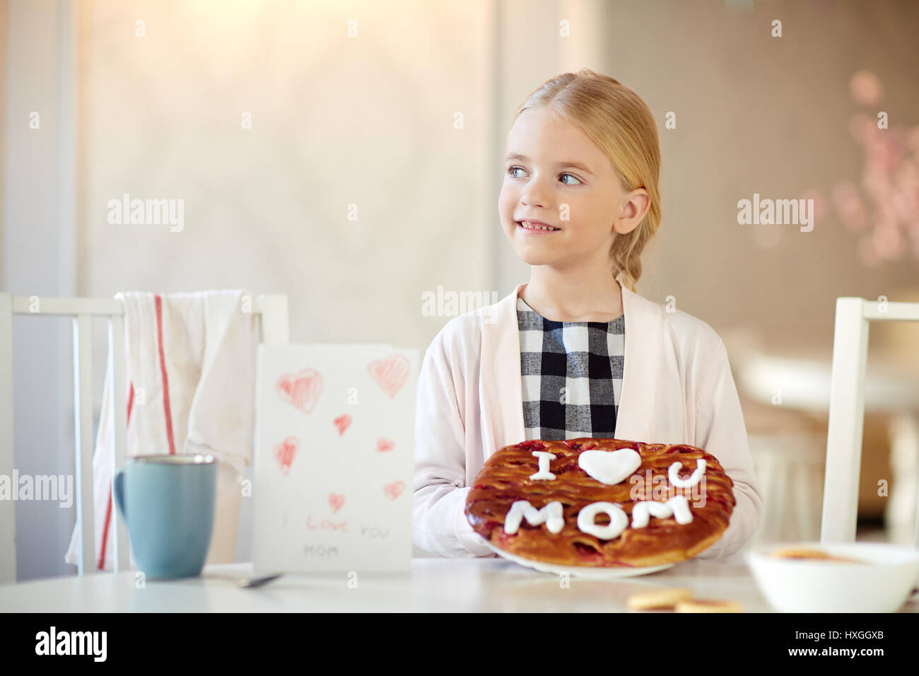 Little girl with handmade pie prepared for her mother Stock Photo - Alamy