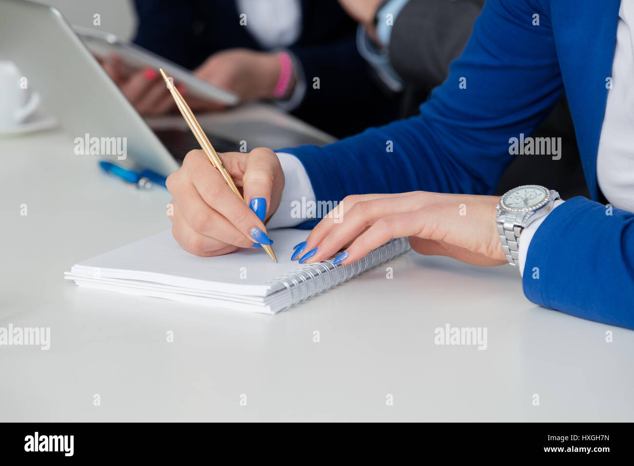 Hand taking notes hi-res stock photography and images - Alamy